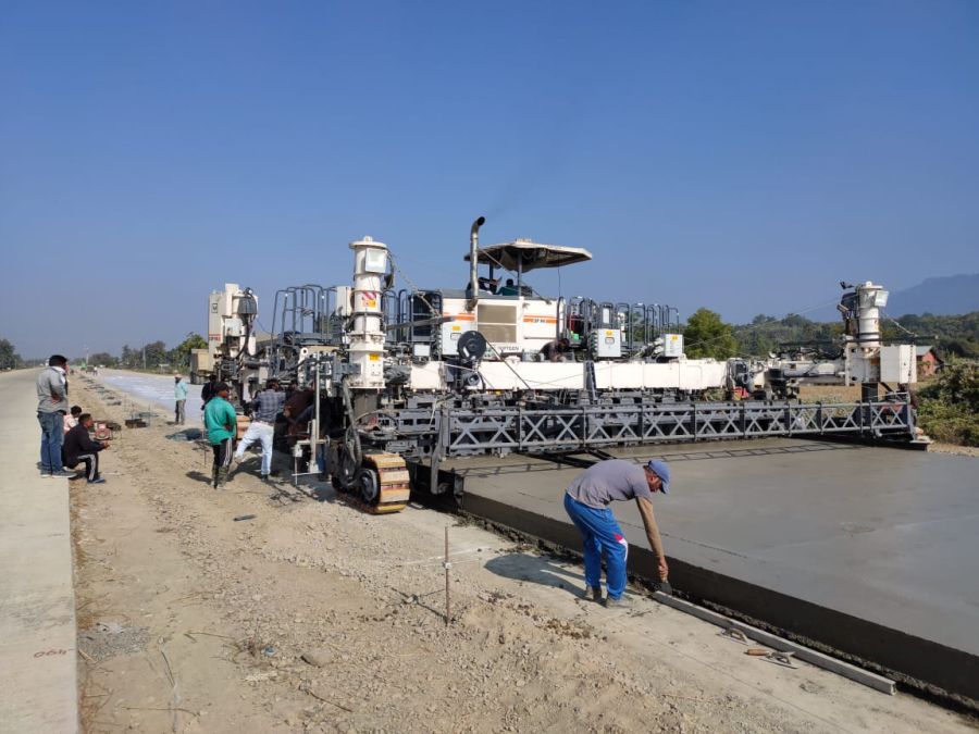 A concrete road paving machine seen at work on Saturday | MorungExpress ...